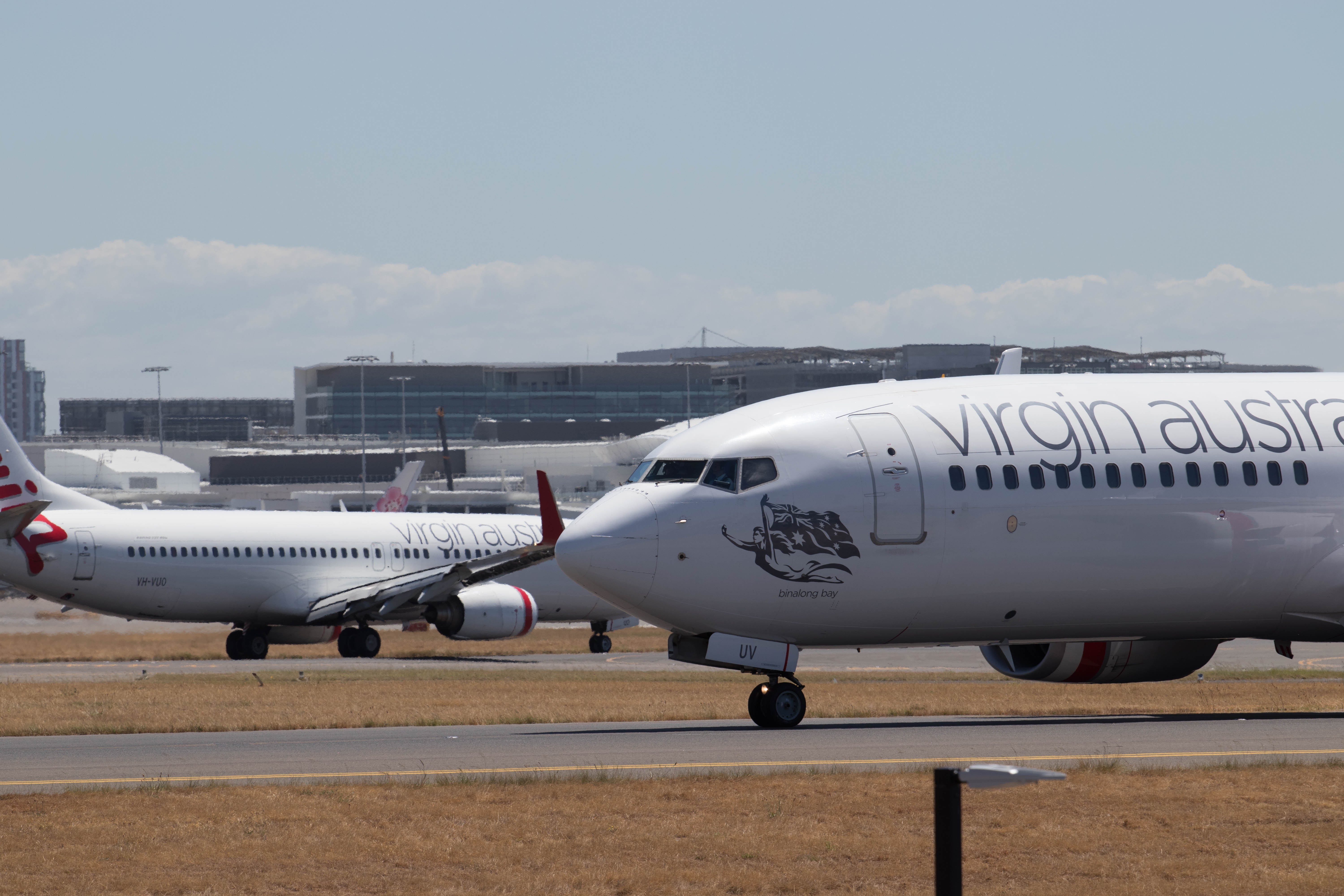 Planespotting with the entry level Canon 200D at Sydney Airport's "Shep ...